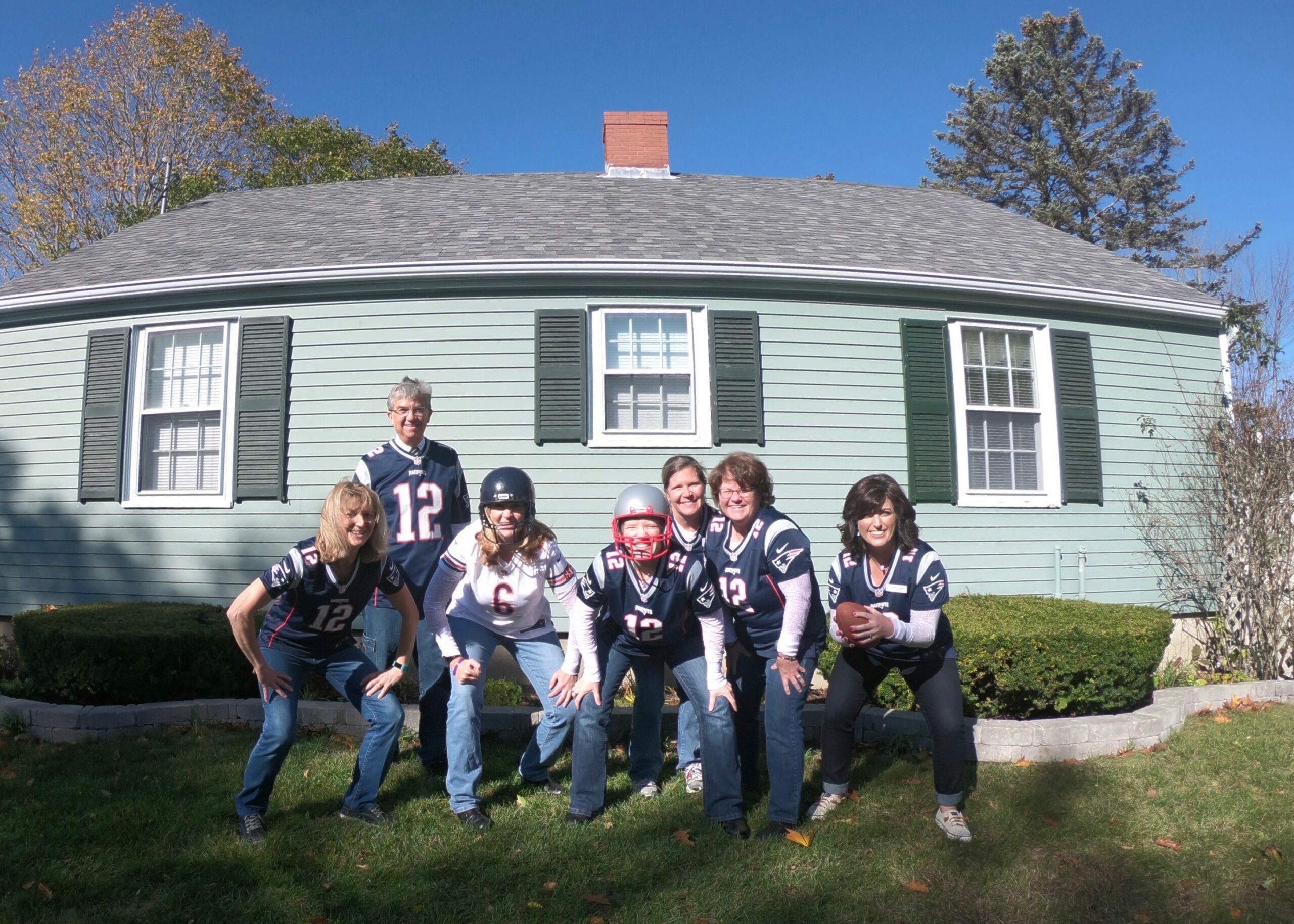 Cheering for the home team. Go New England Patriots! - Seasons of Smiles